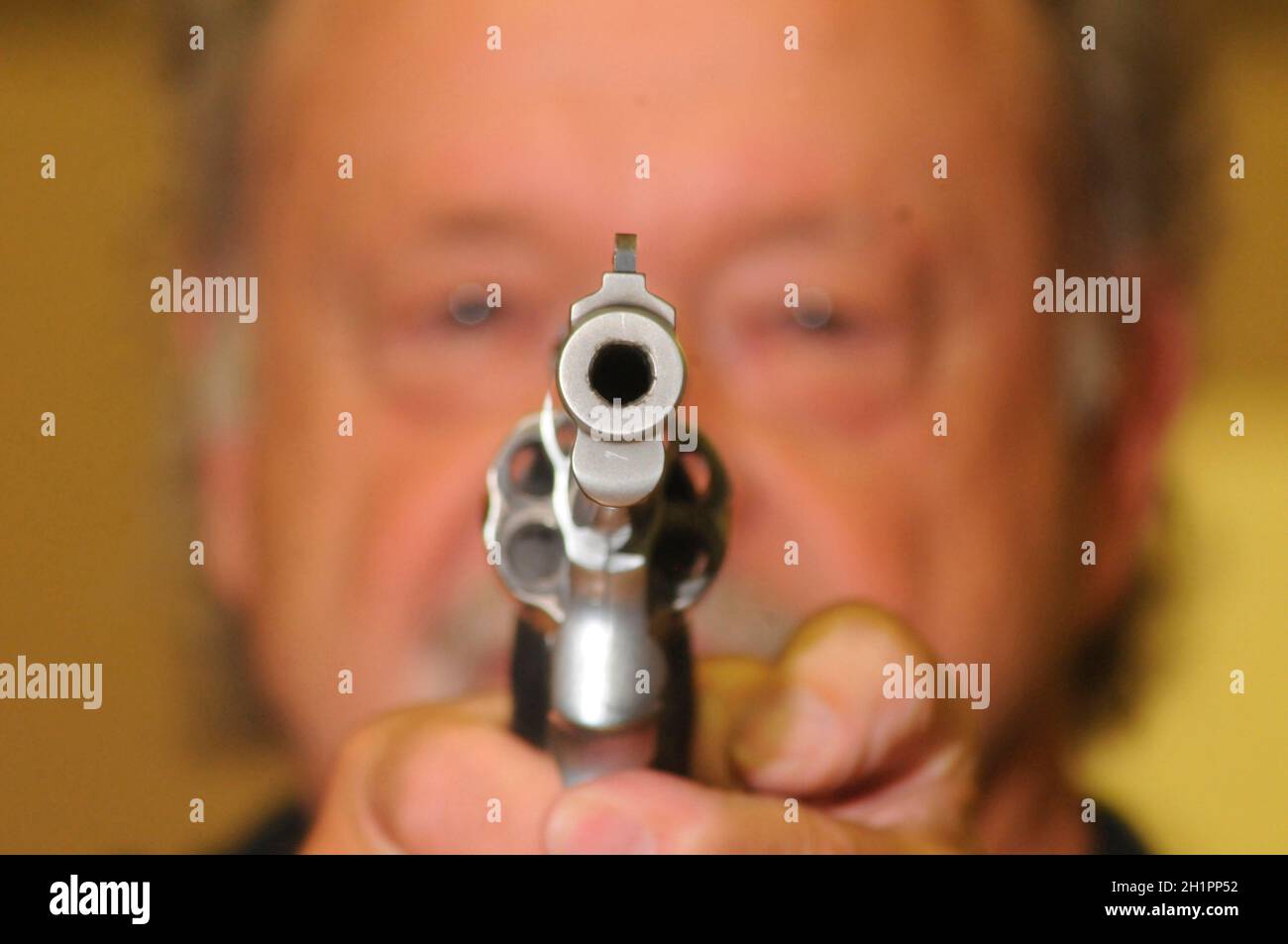 Police man with a revolver hi-res stock photography and images - Alamy