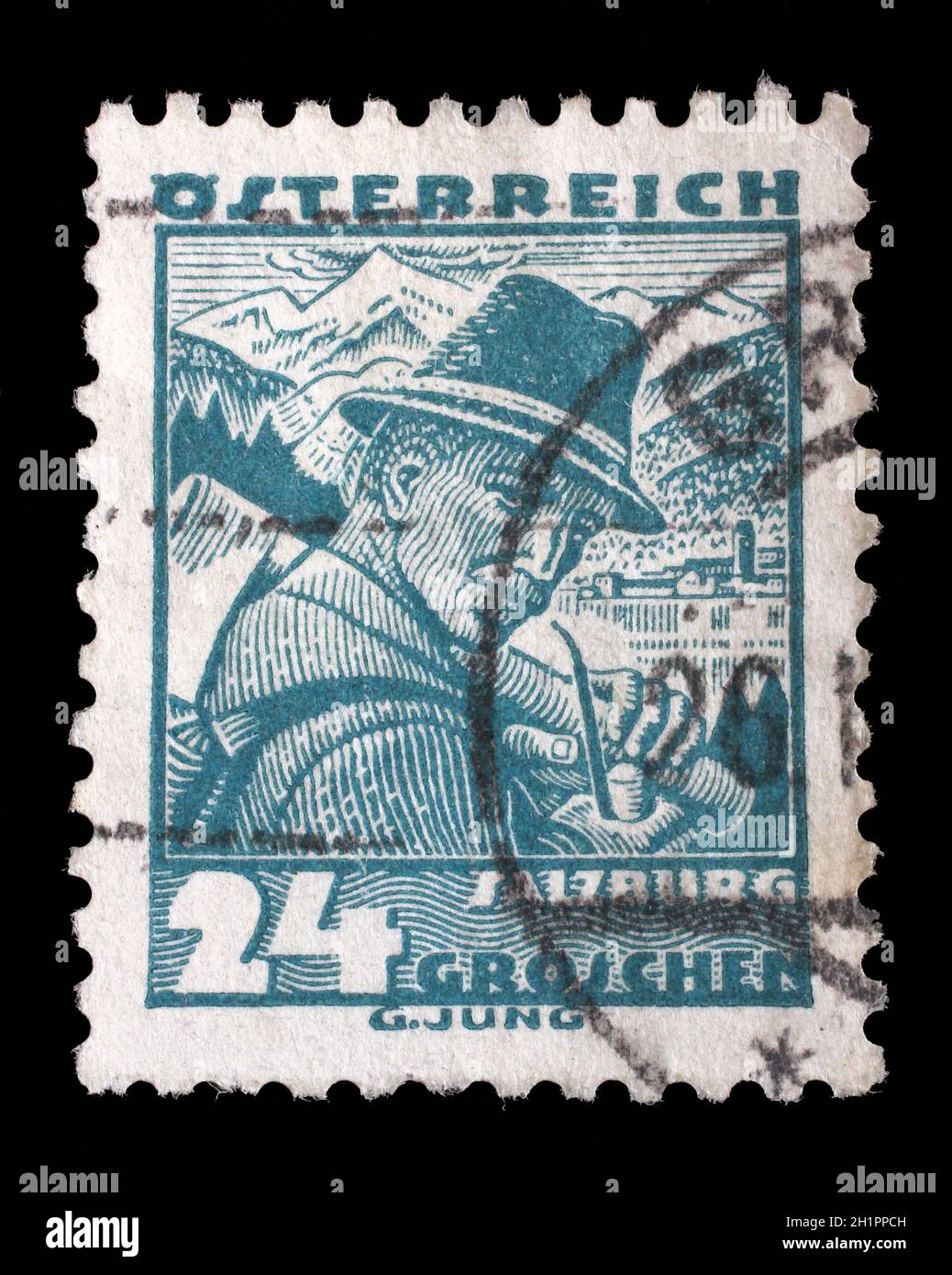 Stamp printed in Austria shows a man in the Austrian national dress ...