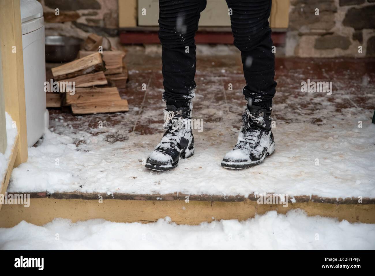 Shoes and boots on porch hi-res stock photography and images - Alamy