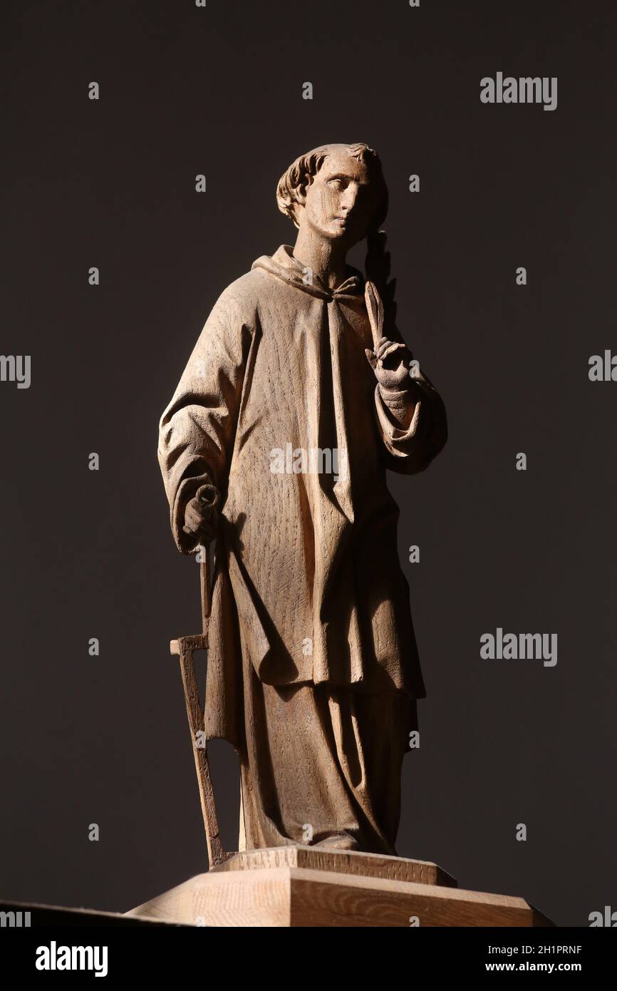 Saint Lawrence of Rome statue in the parish church of St. Peter and ...