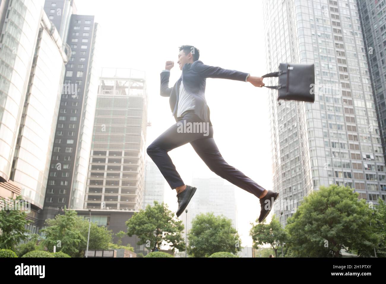 Businessman running away hi-res stock photography and images - Alamy