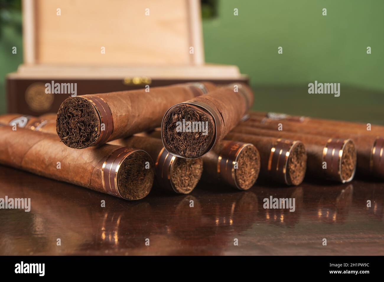 Close up of cigars on a table Stock Photo - Alamy