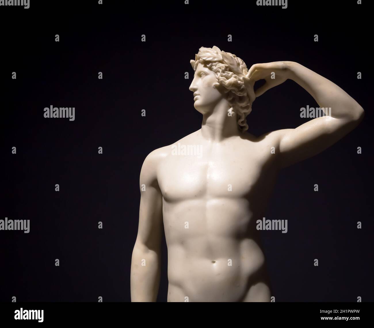 MILAN, ITALY - June 2020: the ancient sculpture Apollo Crowning Himself ...