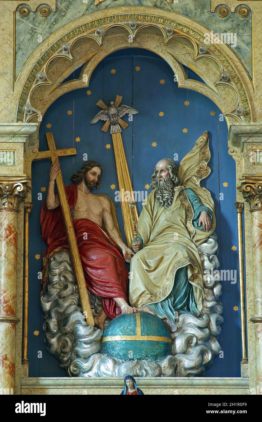 Holy Trinity statue on the main altar in the church of the Holy Trinity ...