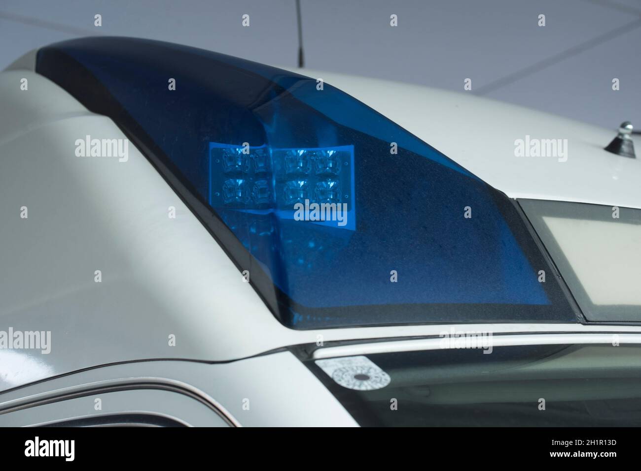 Blue Light Signal On An Ambulance Vehicle During Rescue Operation Stock blue-light-signal-on-an-ambulance-vehicle-during-rescue-operation-stock