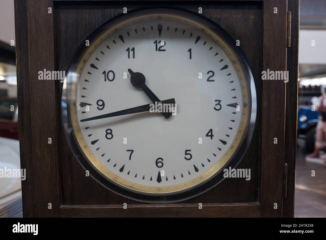 a vintage analog clock with hour hand and minute hand Stock Photo - Alamy