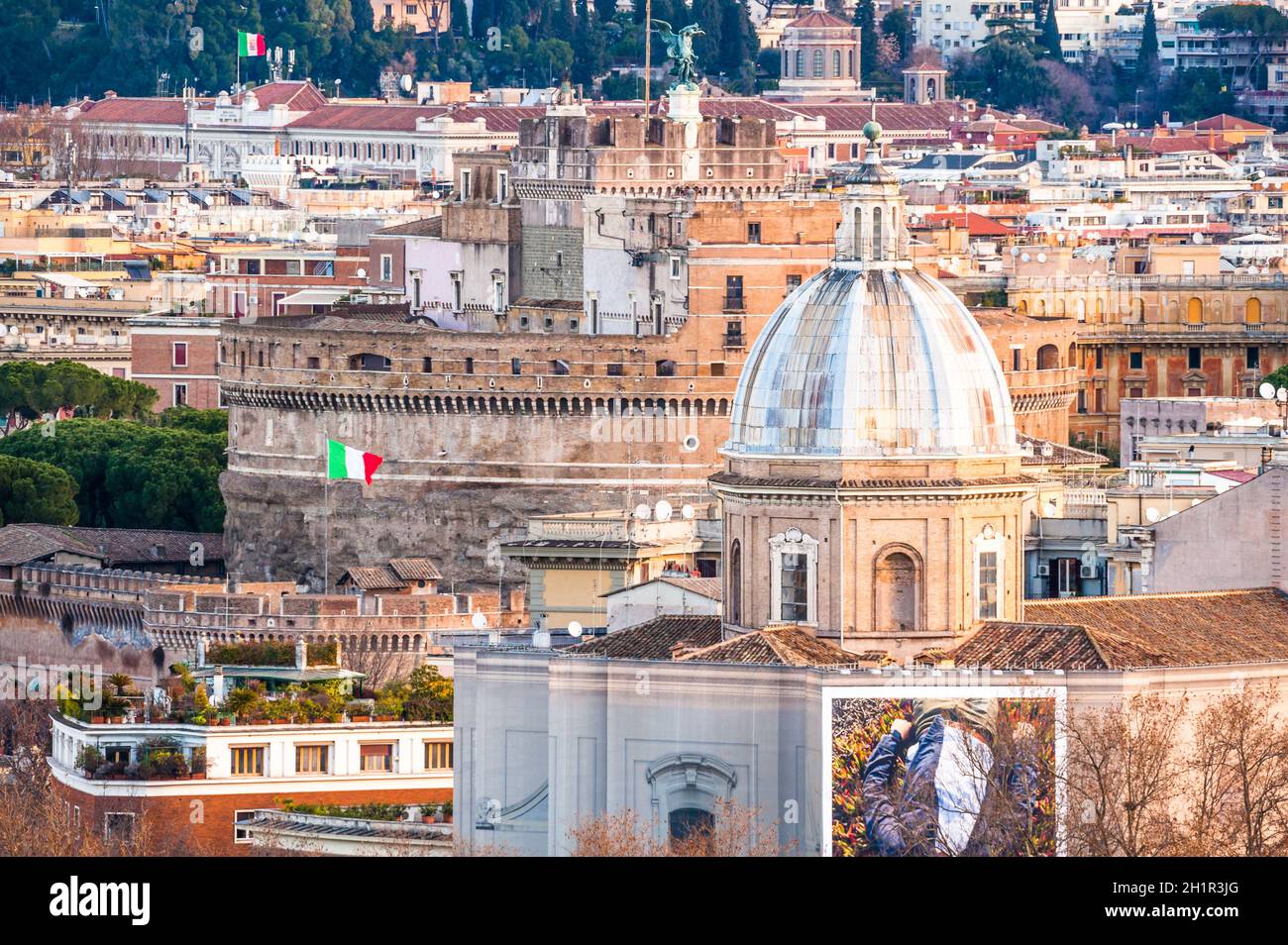The Italian flag flies next to the Castle of the Holy Angel in Rome ...