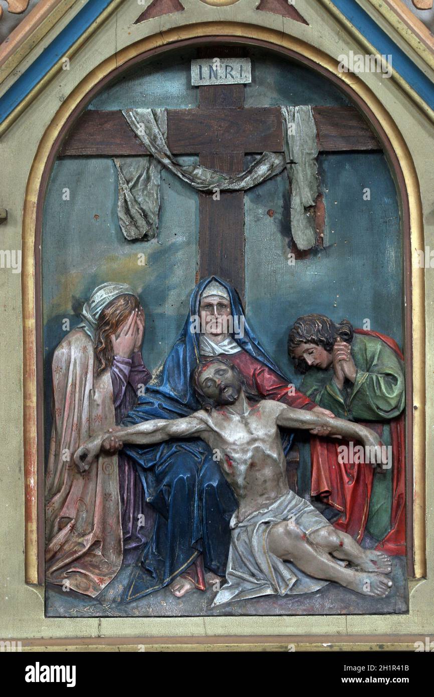 13th Stations of the Cross, Jesus' body is removed from the cross Stock ...