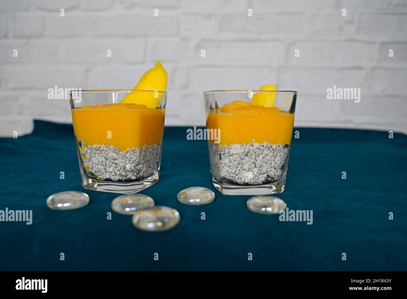 Dessert with mango puree arranged in a glass Stock Photo - Alamy