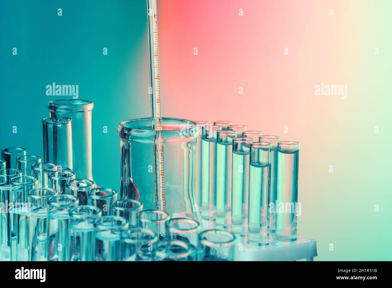 Laboratory chemistry glassware on green toned background Stock Photo ...