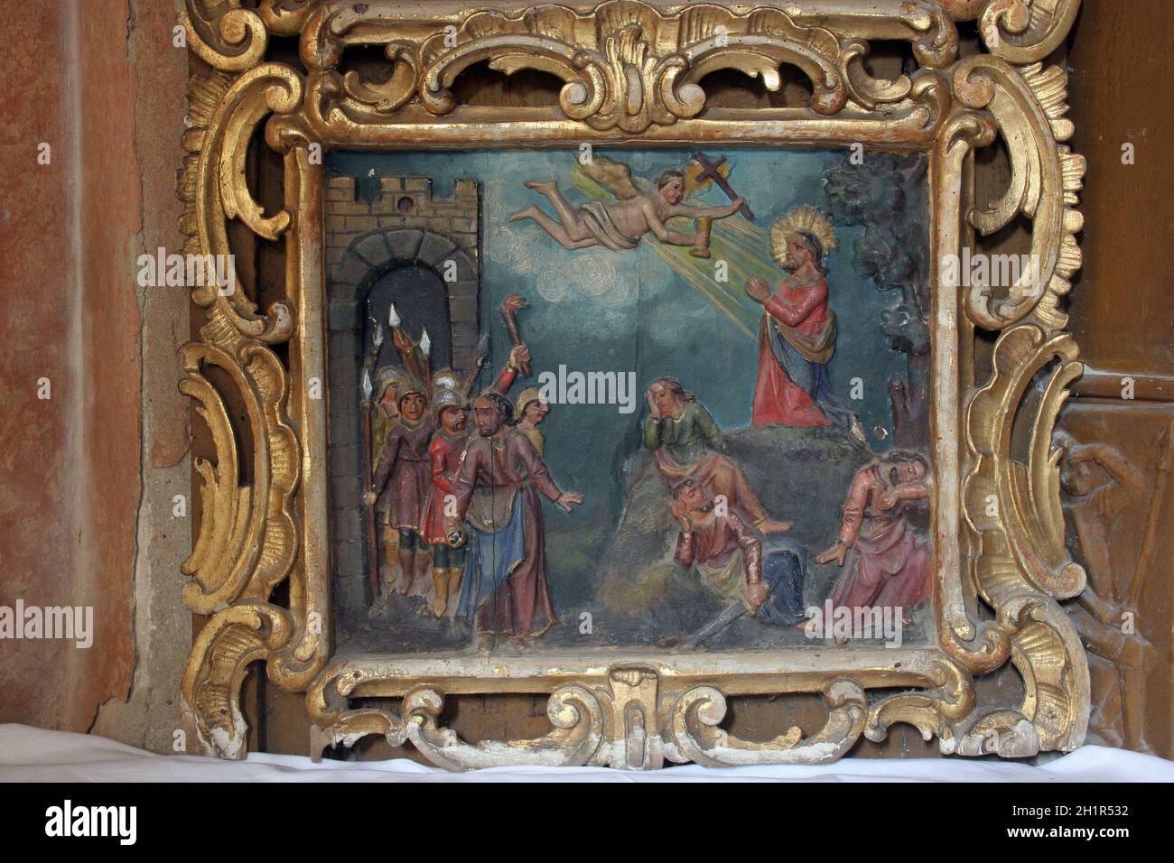 Jesus prays while the disciples sleep Stock Photo - Alamy