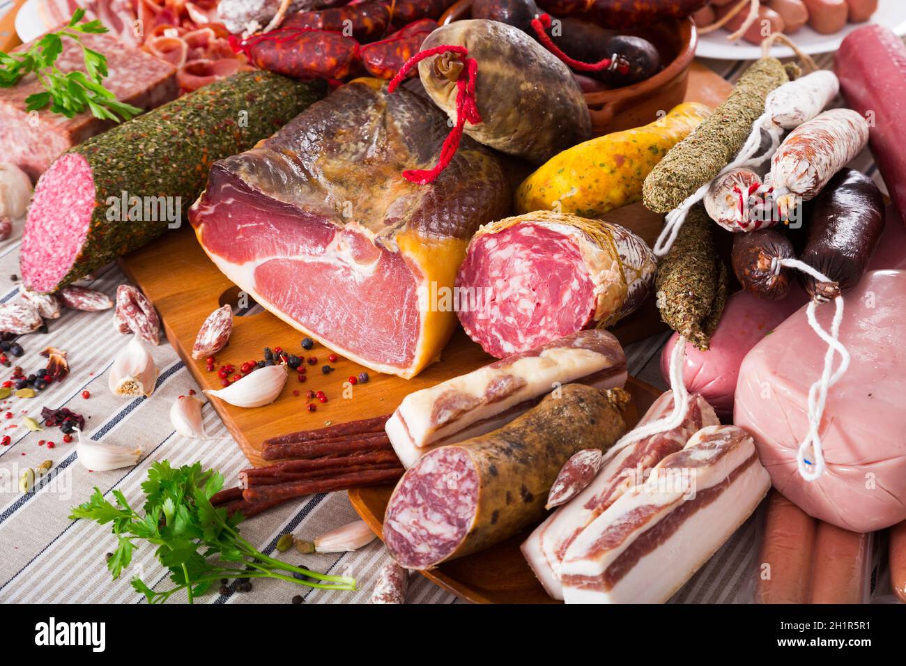 Variety of meats on table Stock Photo - Alamy