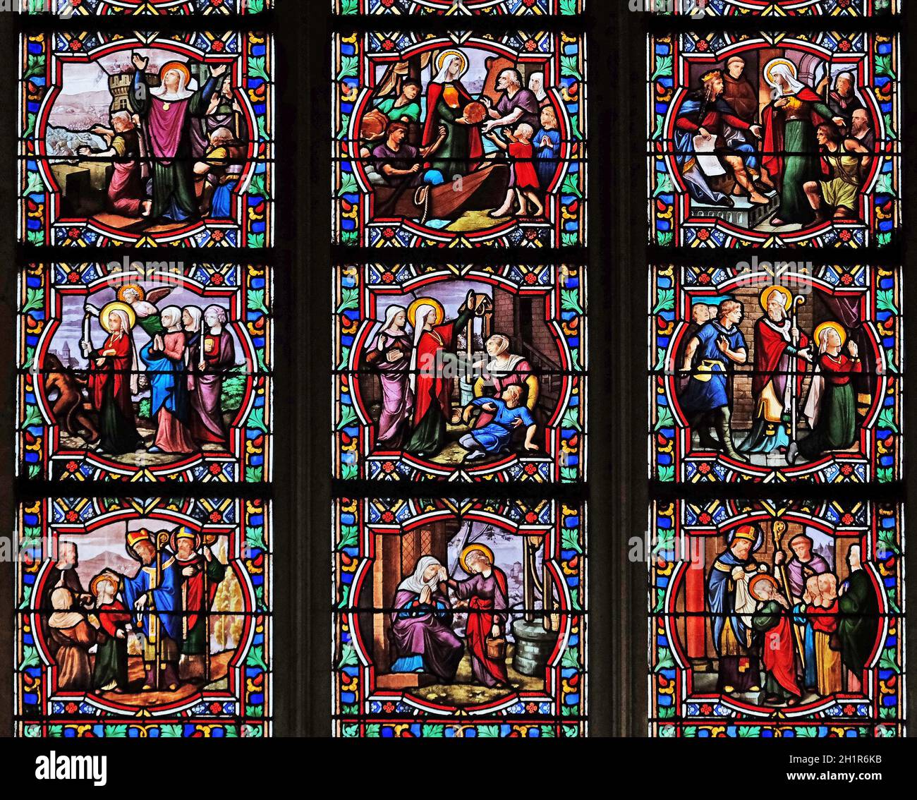 Scenes from the life of St. Genevieve, stained glass window in Church ...