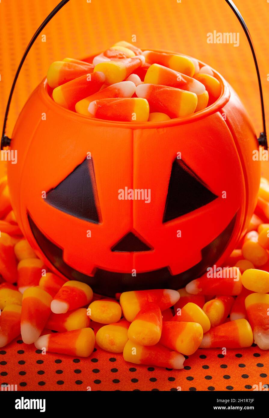 Plastic Jack O Lantern Filled with Candy Corn Stock Photo - Alamy