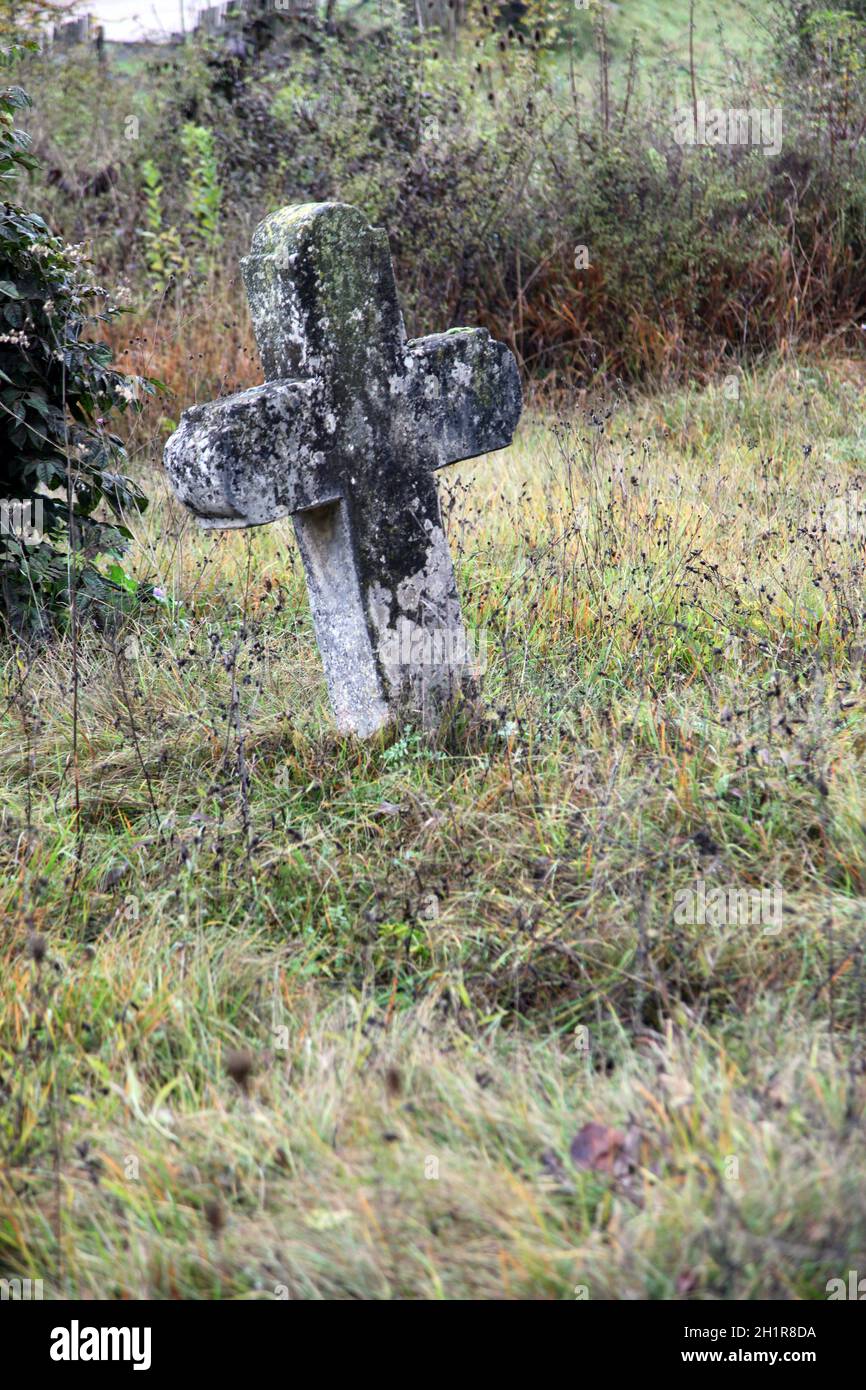 Stone cemetery cross Stock Photo - Alamy