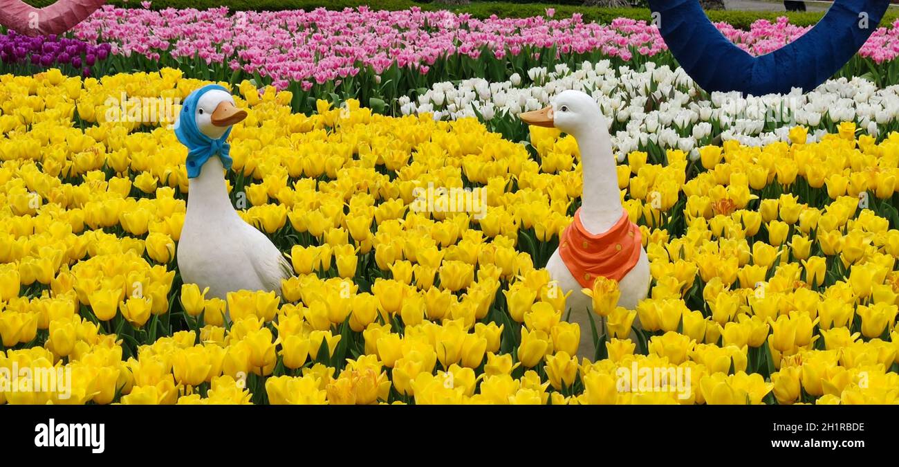 Taipei, Taiwan, February 26 2021: Decorative dutch mill and a boat with ...