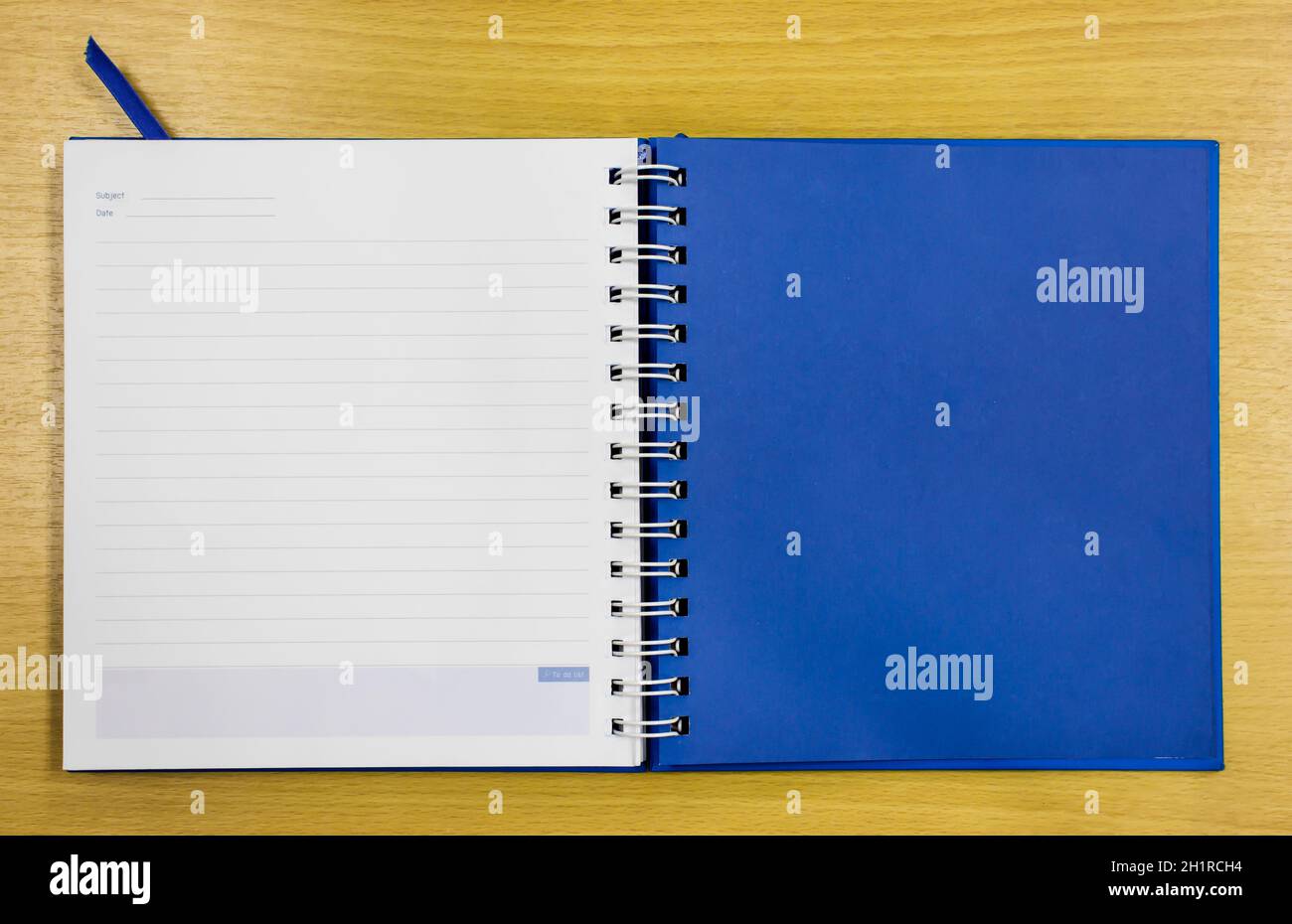 blue diary book on table office Stock Photo - Alamy
