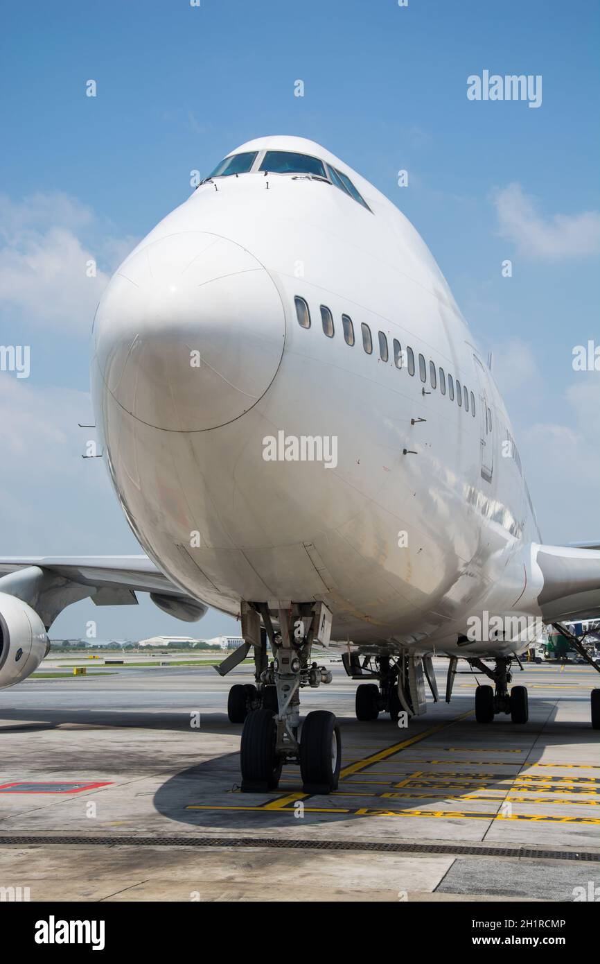 Airplane parked at the airport Stock Photo - Alamy