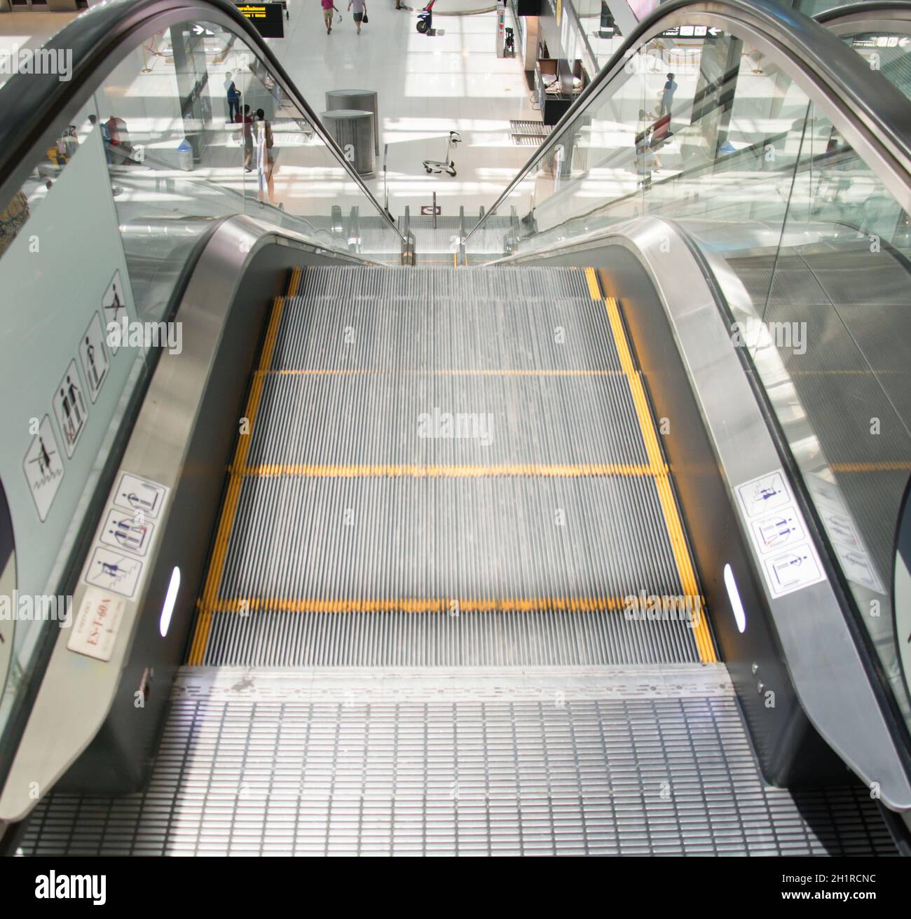 Escalator stairs in station Stock Photo - Alamy