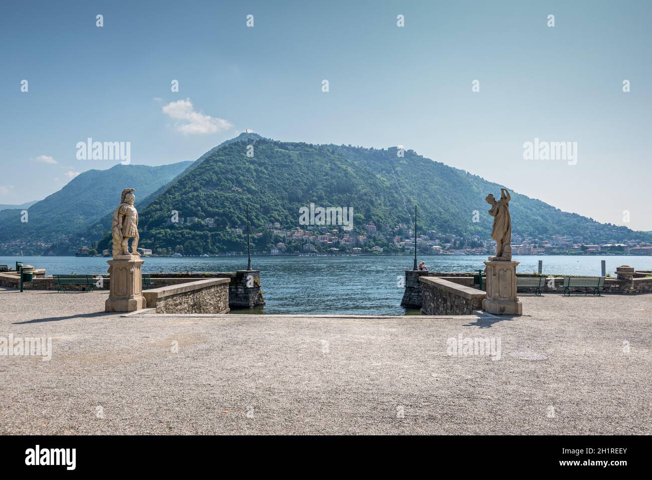 Como, Italy - May 27, 2016: Statues along the public walkways in the ...