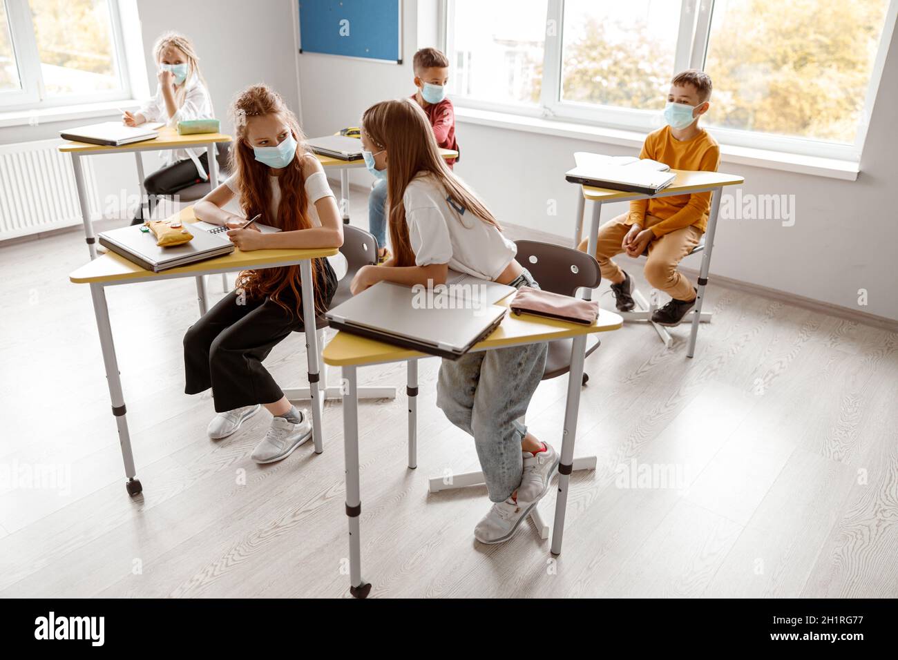 School kids with notebooks enjoying of study together Stock Photo - Alamy