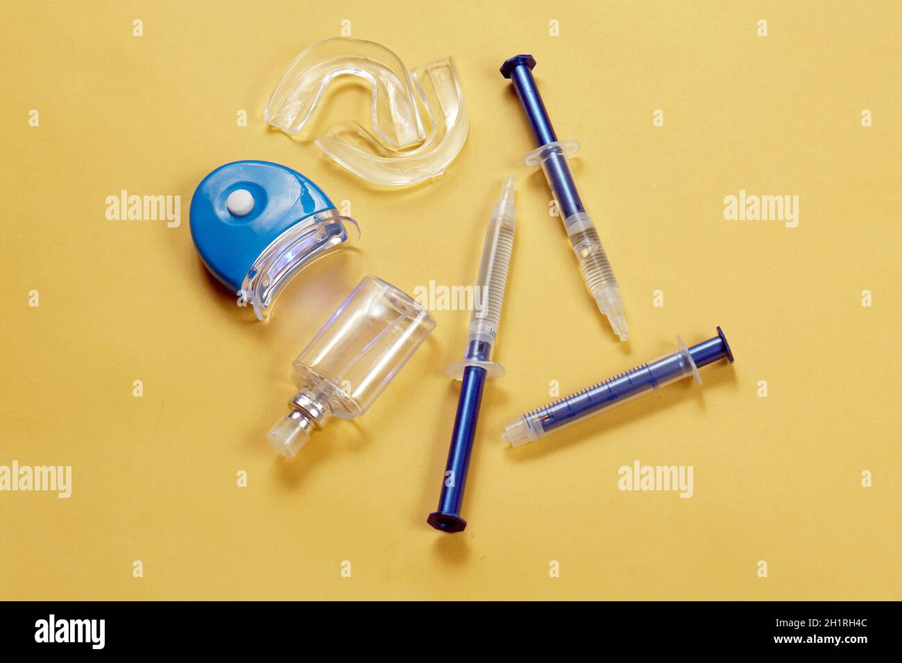 Gel syringes led lamp and mouth trays in kit for teeth whitening at ...