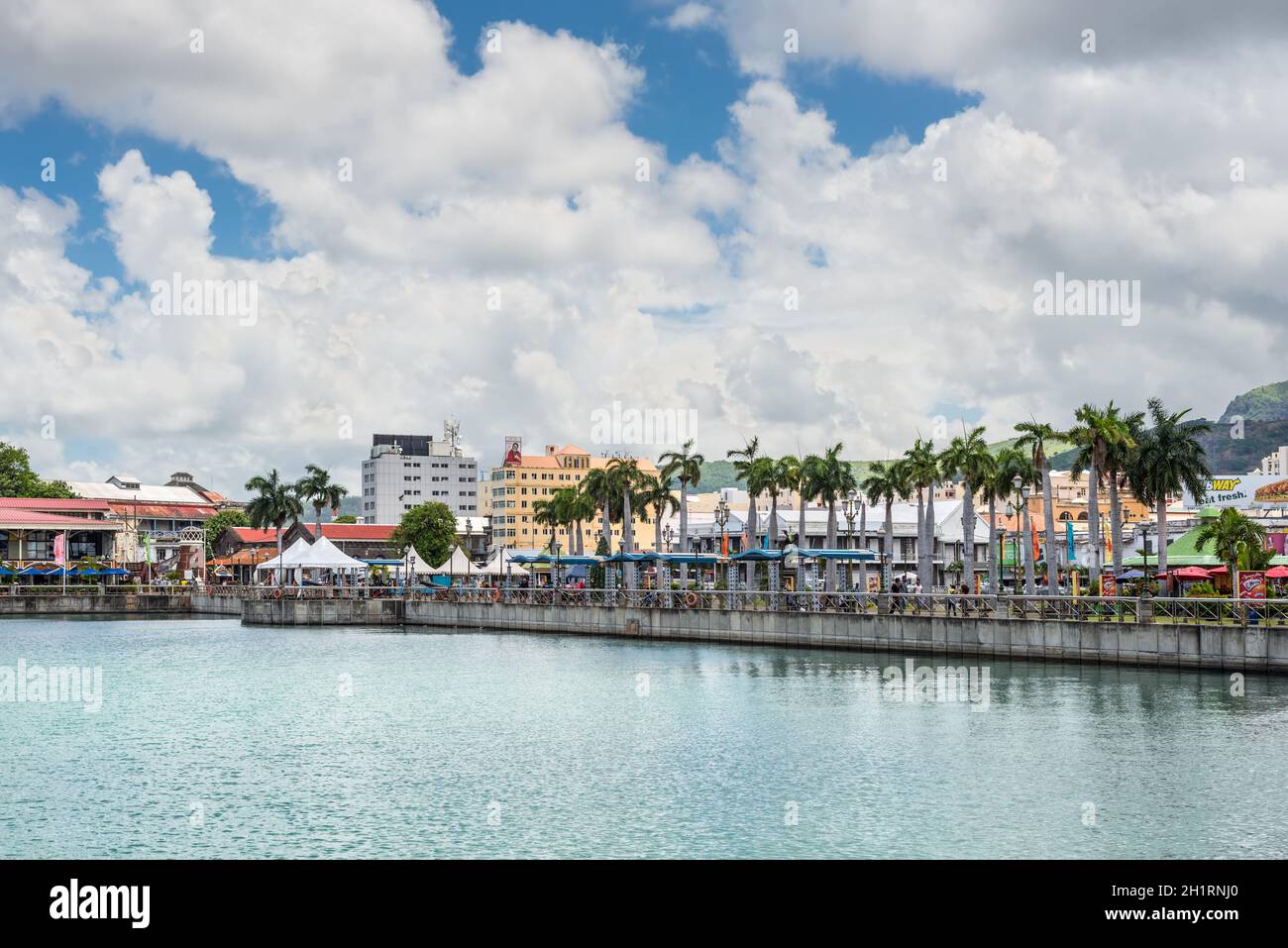 Port Louis, Mauritius - December 25, 2015: Caudan Waterfront pedestrian ...