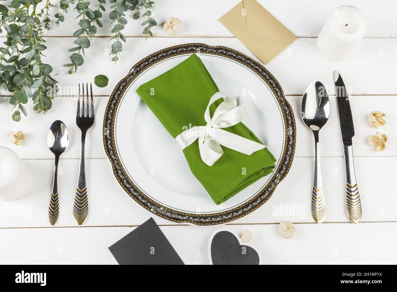 Table with plates and cutlery, view from above Stock Photo - Alamy