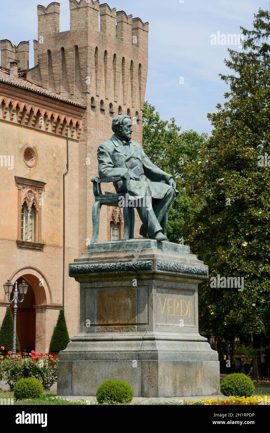 monument of great musician in city center, in background tower of the ...