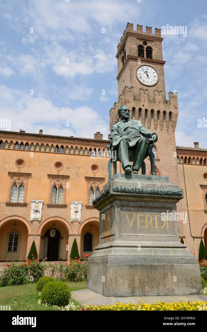 monument of great musician in city center, in background tower of the ...