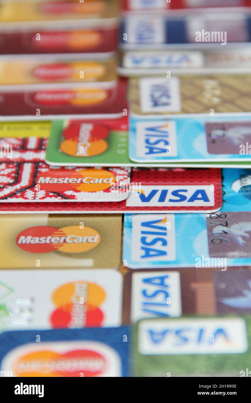 Modern payment systems. VISA and Mastercard credit cards close up ...
