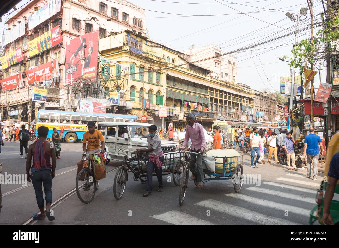 Crowded city street of Bara Bazar, a lively shopping district of ...
