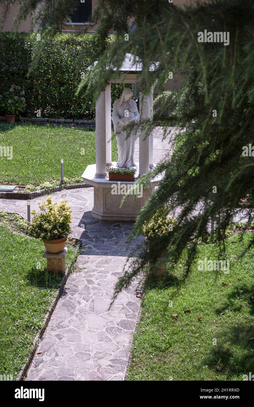 Ancient garden of a monastery in town of Brescia, Italy. Soft focus ...