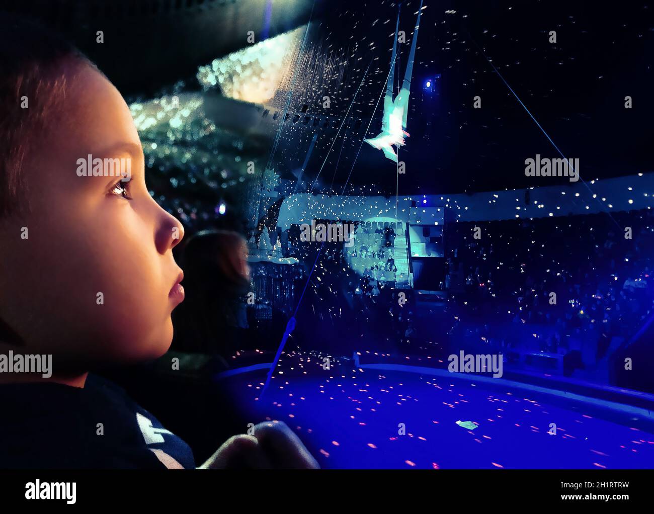 Portrait of astonished child at a circus. Concept of little spectator ...