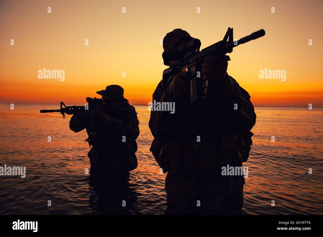 Two commando soldiers, army special operations fighters aiming assault ...