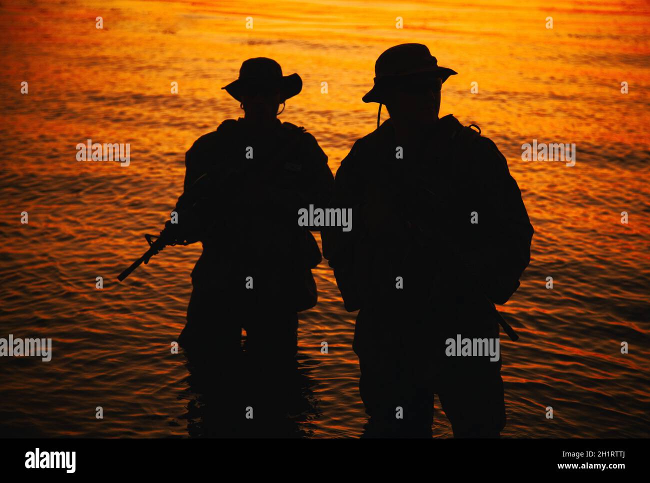 Two commando soldiers, army special operations fighters aiming assault ...