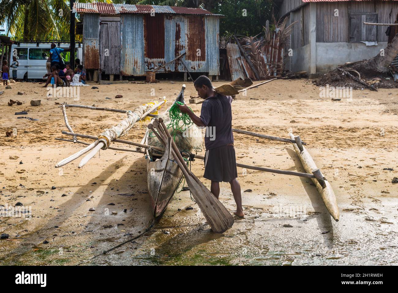 Ambatozavavy, Nosy Be, Madagascar - December 19, 2015: Boatman and his ...