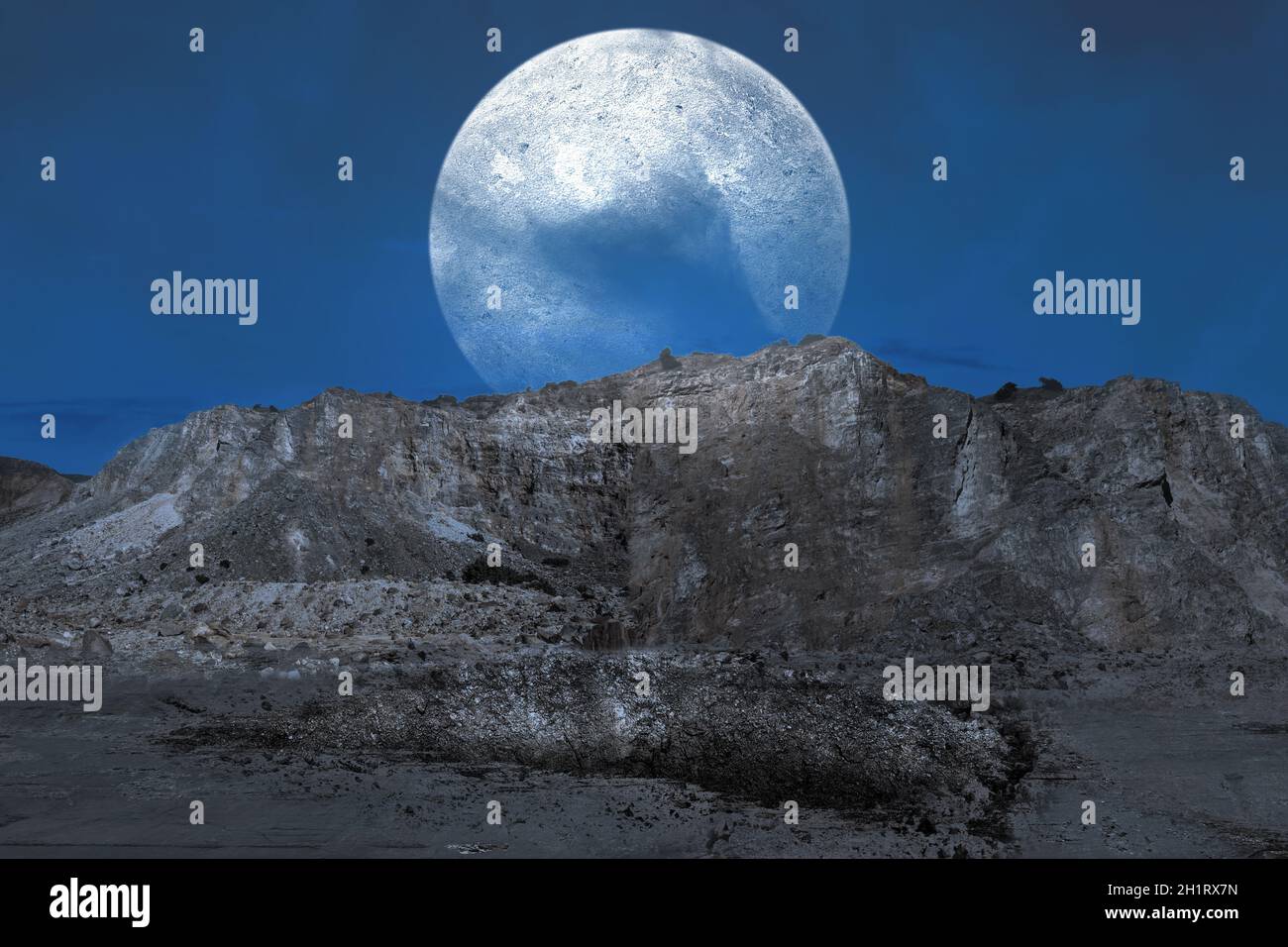 Spooky rock hills with the night scene background Stock Photo - Alamy
