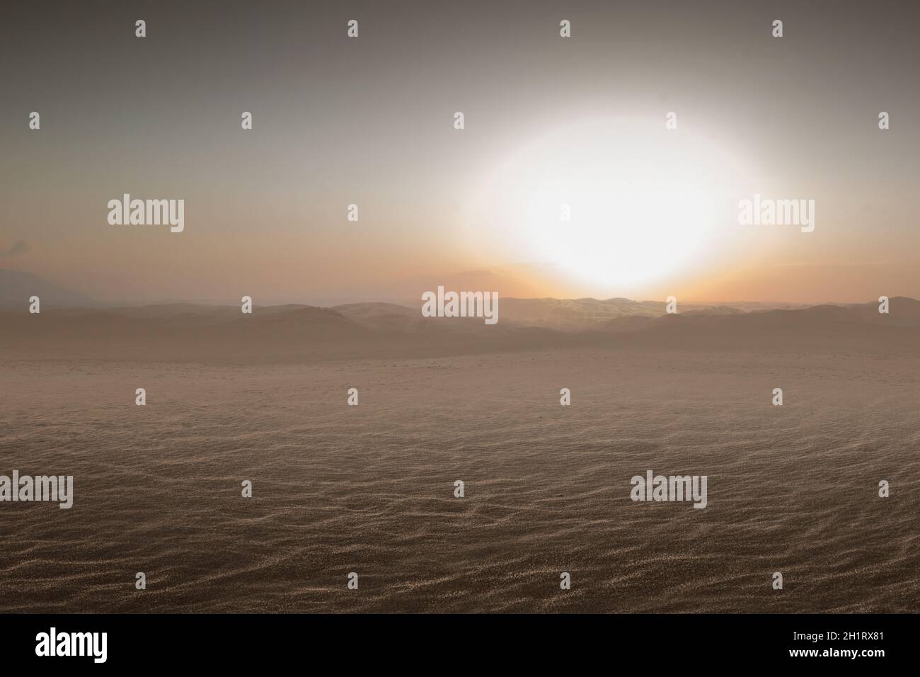 Views of sand dune with a sunset sky background Stock Photo - Alamy
