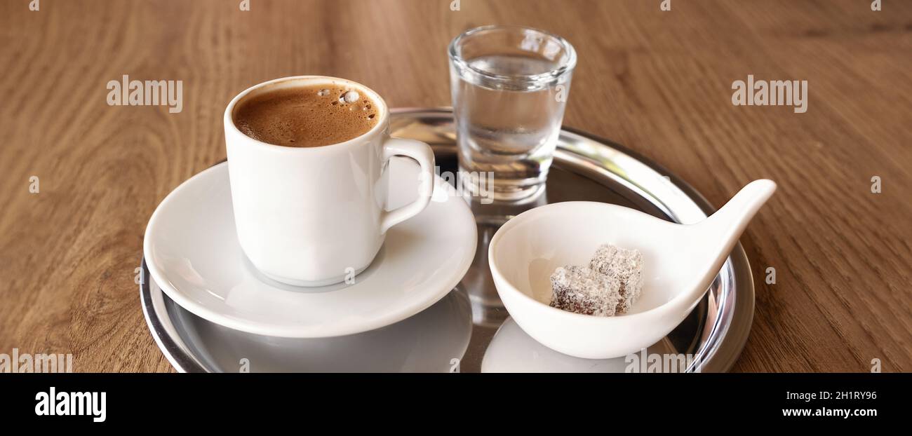 Traditional Turkish coffee with cold water and Turkish delight - Image ...