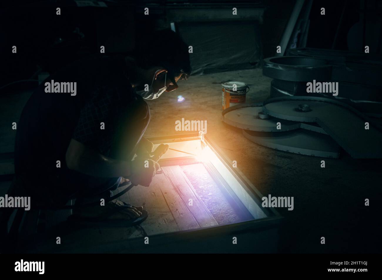 Welder used grinding stone on steel in factory with sparks, Welding ...