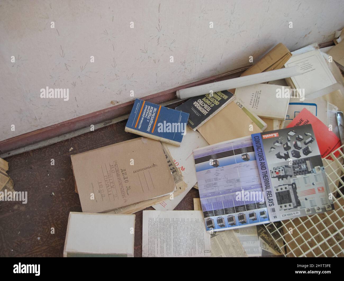 Old paper archives of an abandoned power plant. old unnecessary paper ...