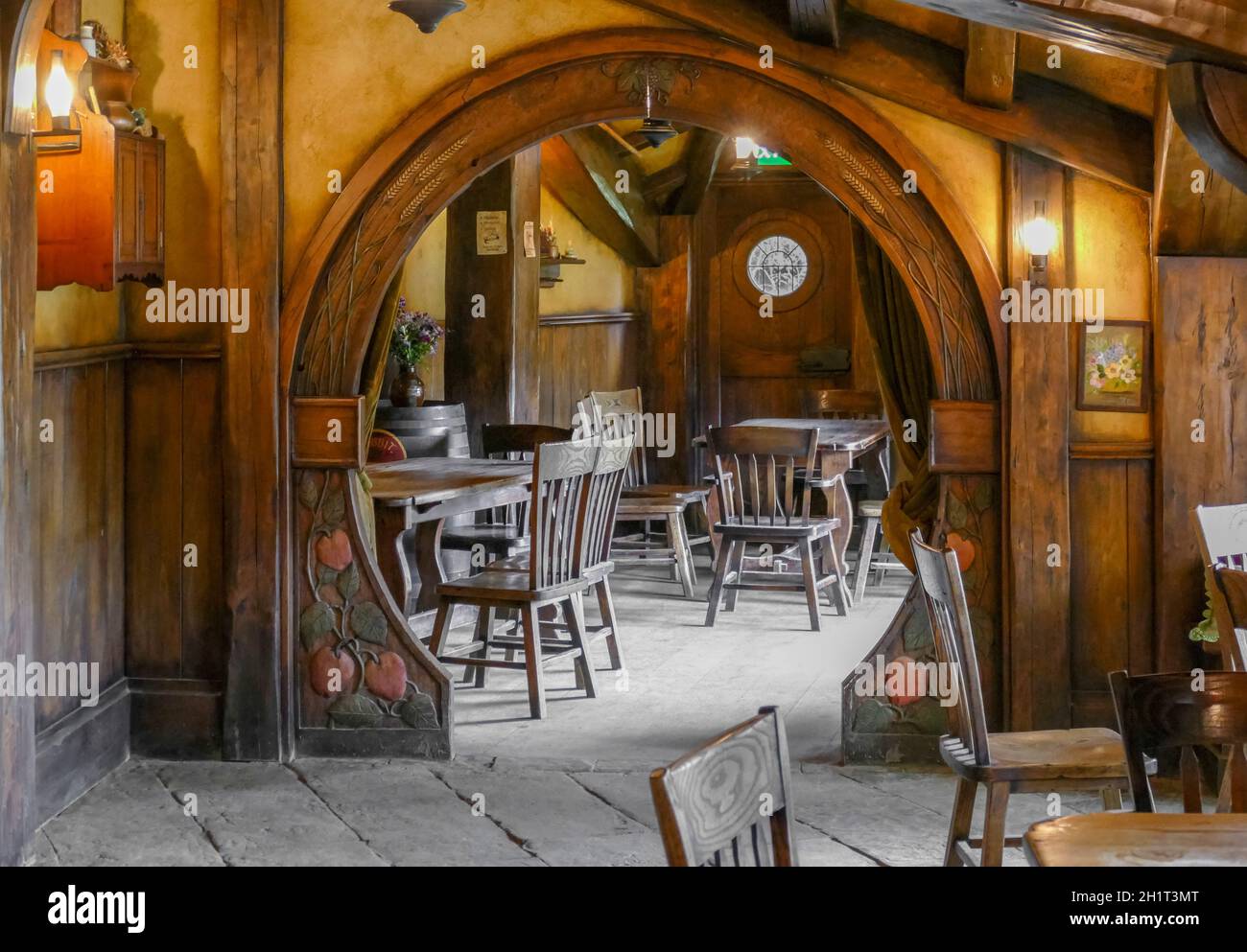 Idyllic scenery inside a tavern at The Shire represented by a region ...