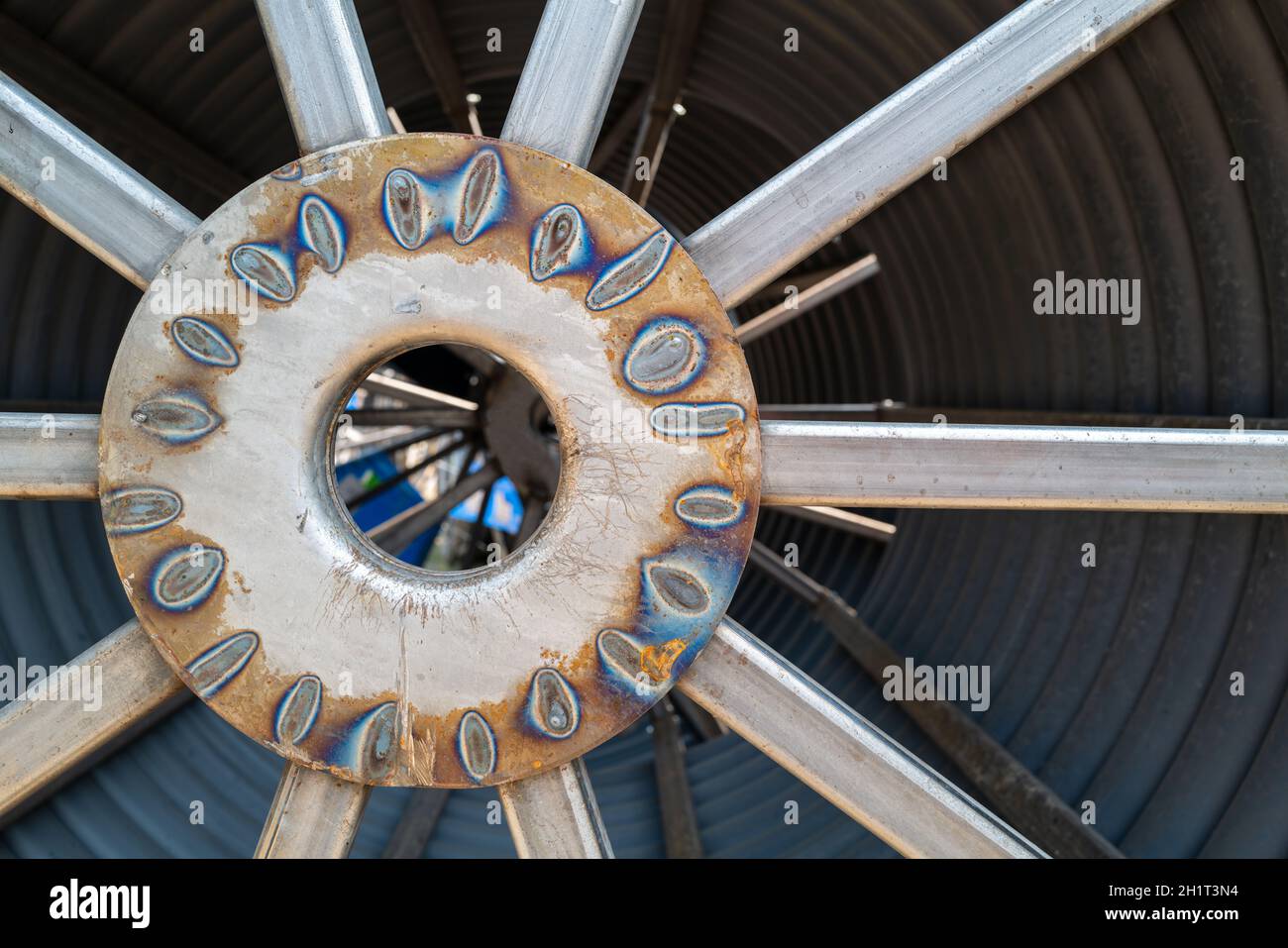 A metal spool of heavy conduit Stock Photo - Alamy
