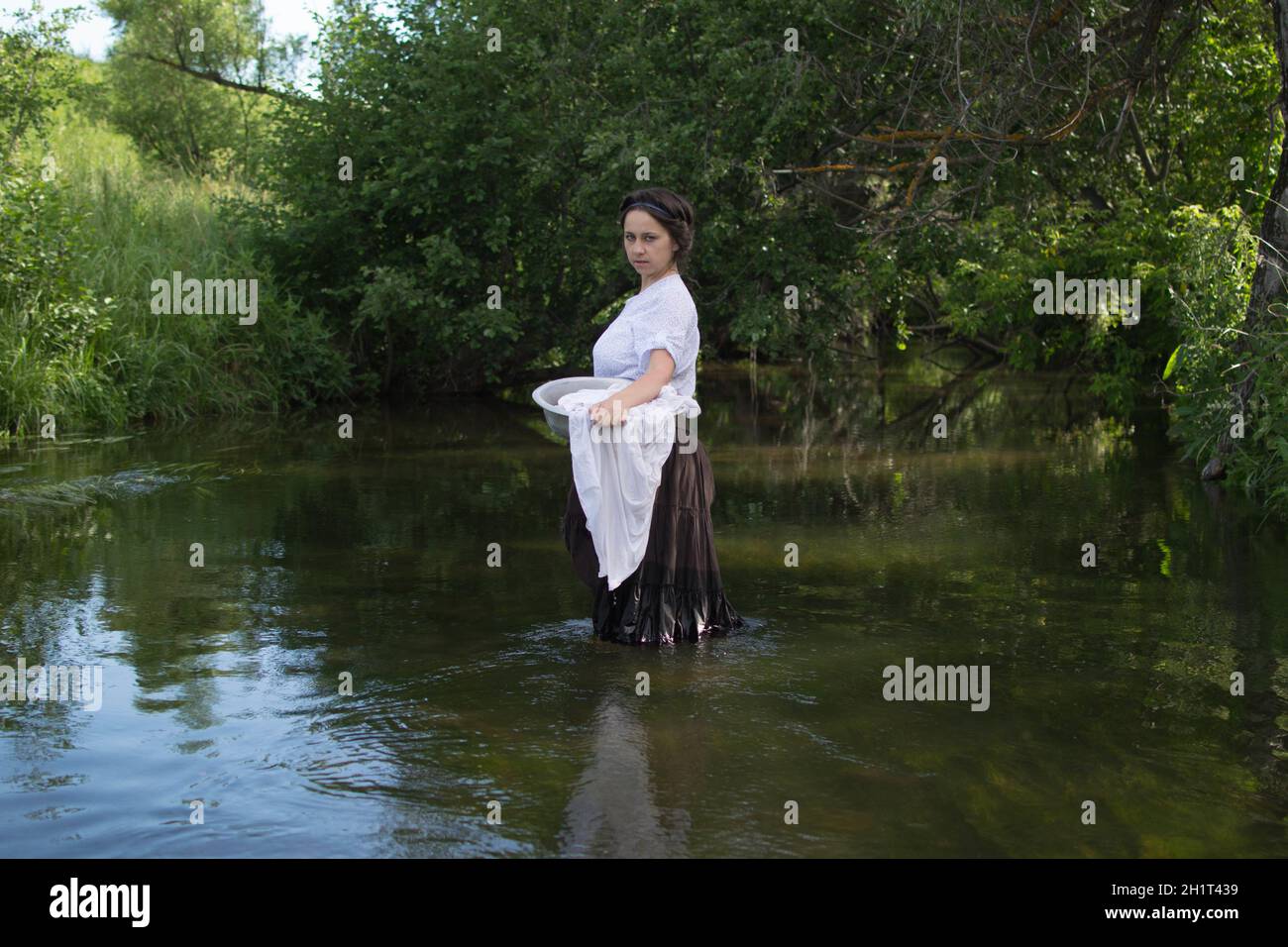 Rinsing clothes hi-res stock photography and images - Alamy