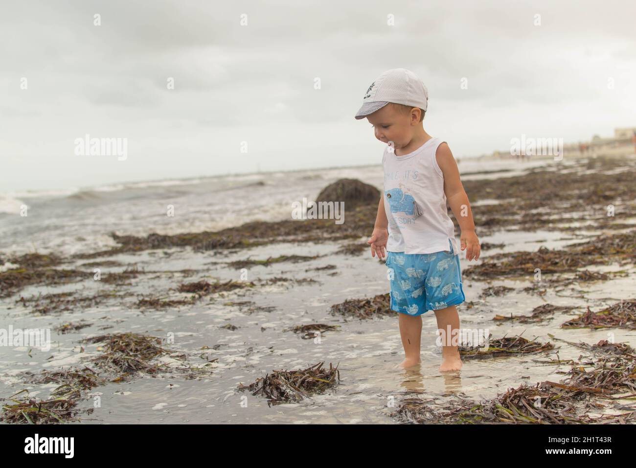 boy playing on the beach Stock Photo - Alamy