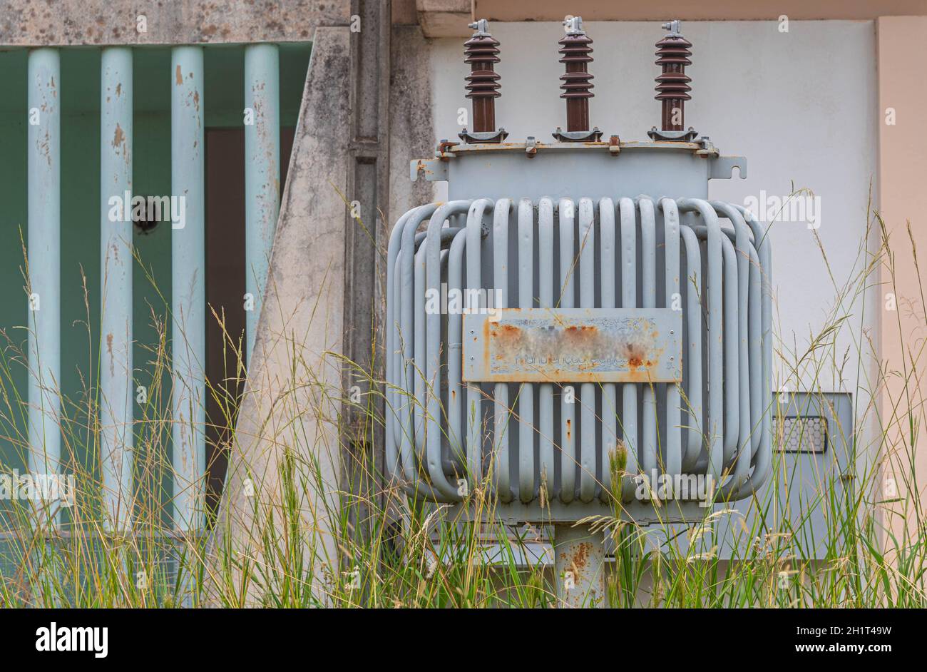 Electricity transformer in abandoned house. Energetic equipment ...