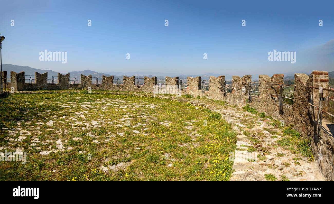 view of merlons that stand over the ramparts at ancient Castle , shot ...