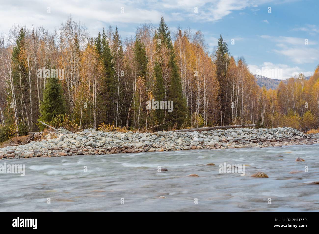 Autumn landscape of the river and forest in Hemu Village, a historic ...