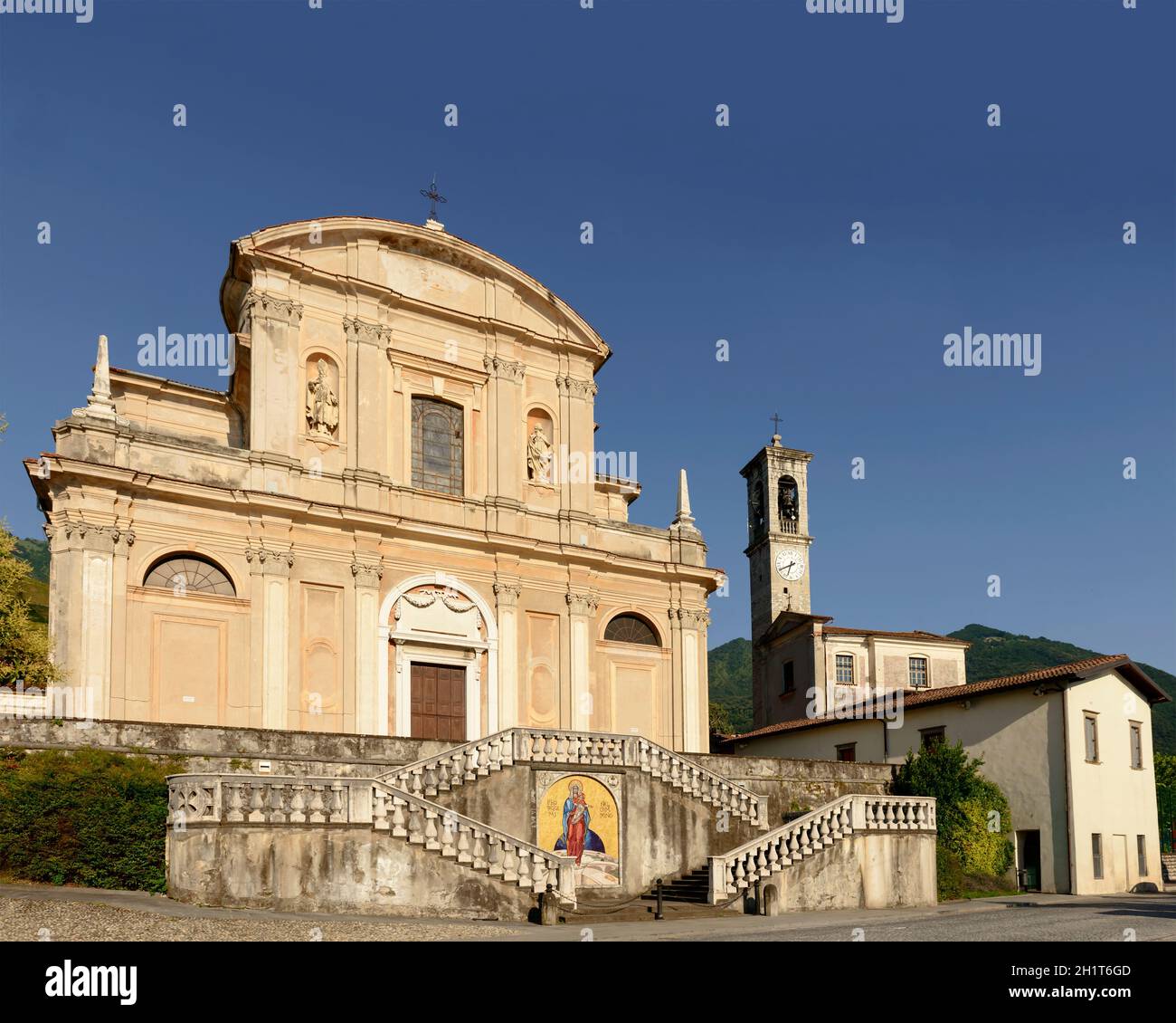 facade and monumental stairs of san Zenone church, shot in bright ...